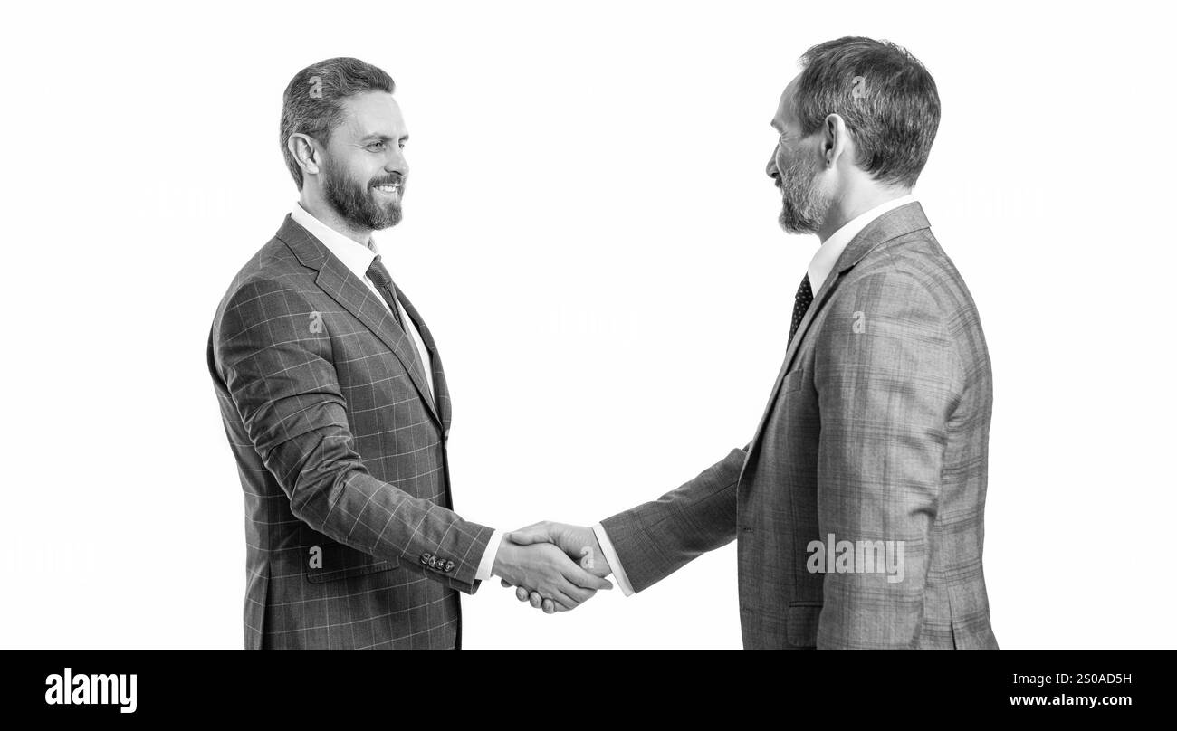 two businessmen handshaking after successful business deal. business ...