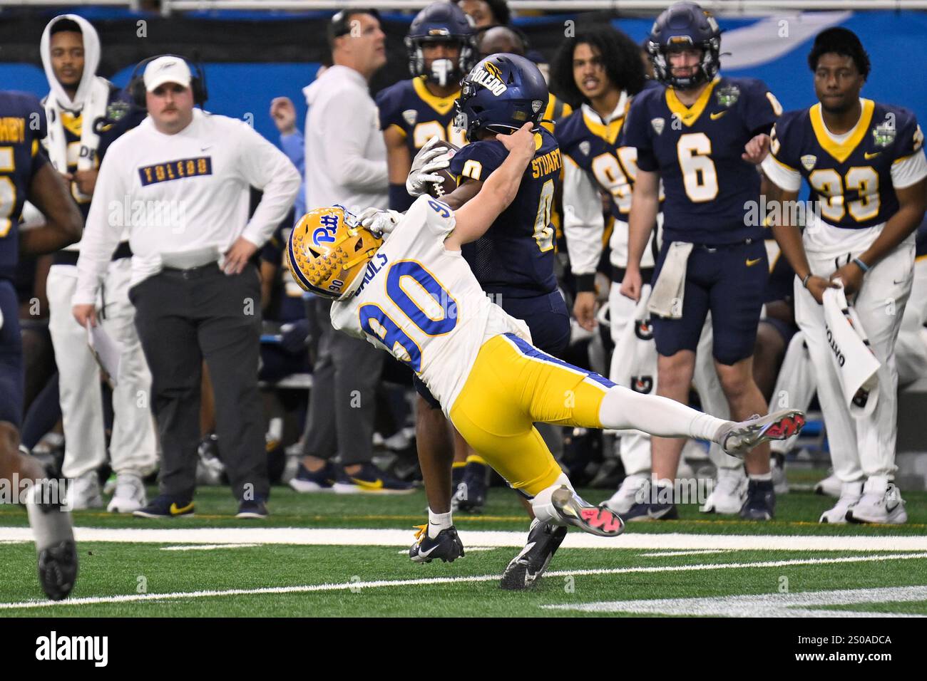 DETROIT, MI - DECEMBER 26: Toledo Rockets RB Jacquez Stuart (4) gets ...