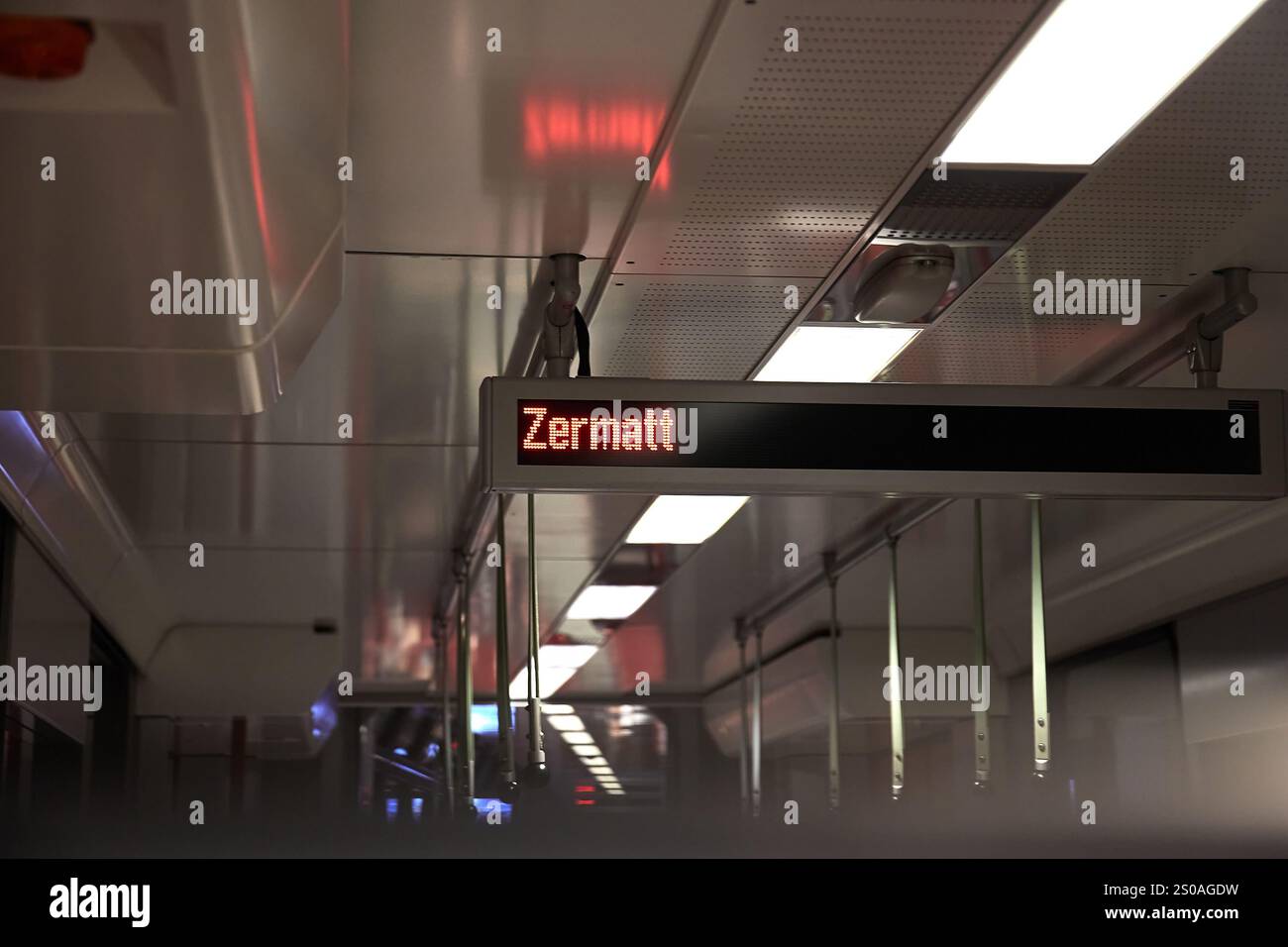 Traveling on Swiss train next station screen Zermatt Stock Photo - Alamy