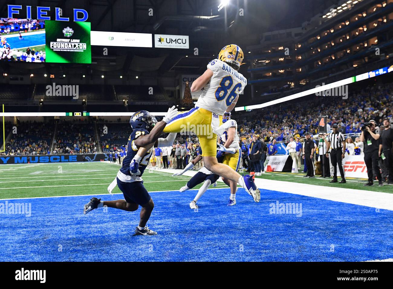 Pittsburgh tight end Gavin Bartholomew, right, catches a pass for a two ...