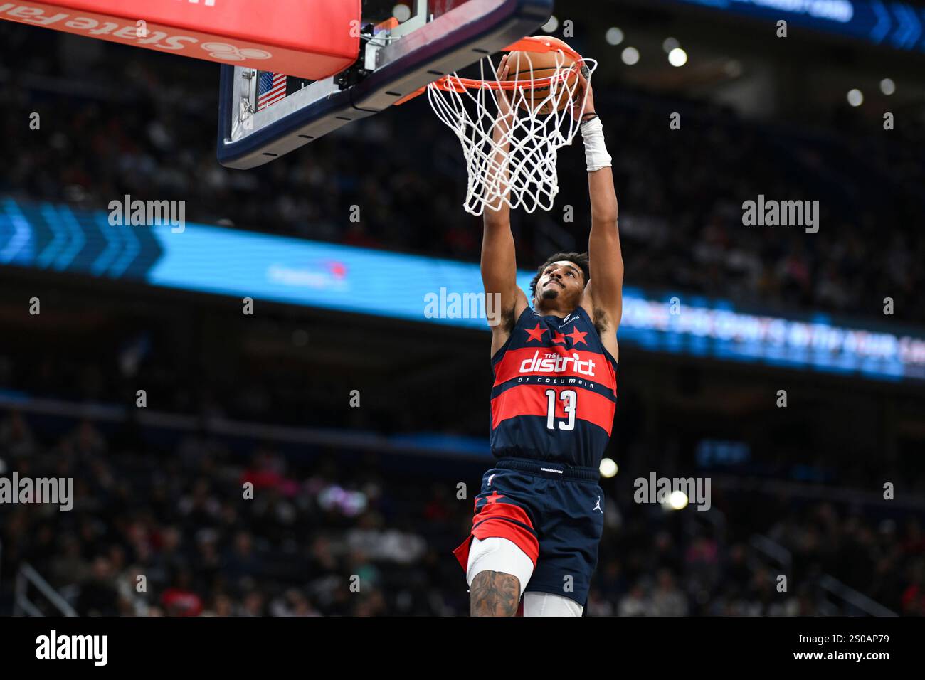 Washington Wizards guard Jordan Poole (13) goes to the basket for a ...