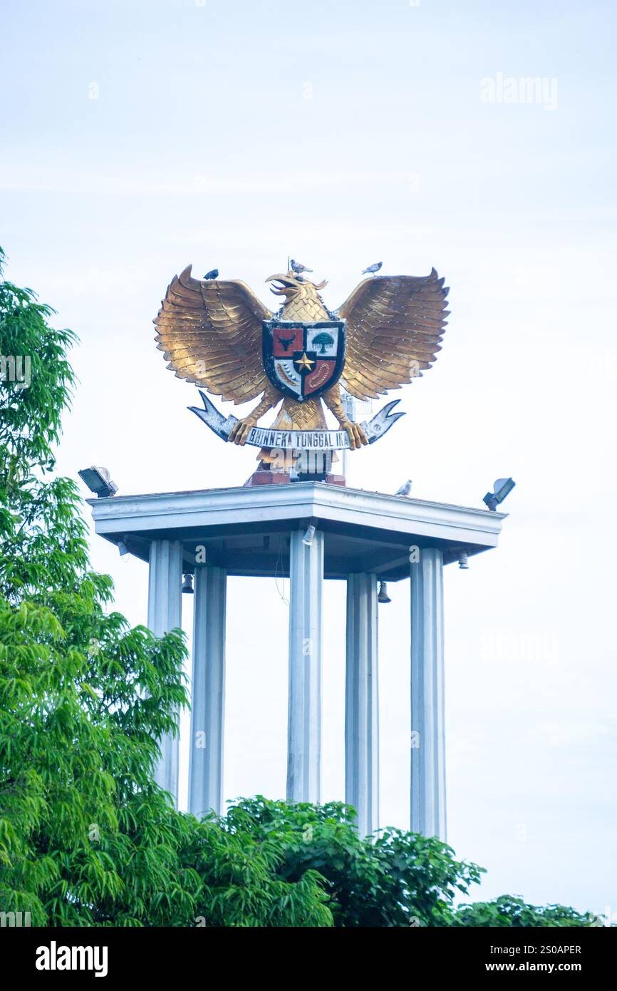 Garuda pancasila with sky background Stock Photo - Alamy
