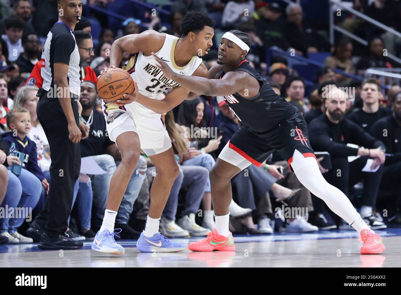 Houston Rockets forward Jae'Sean Tate (8) defends New Orleans Pelicans ...