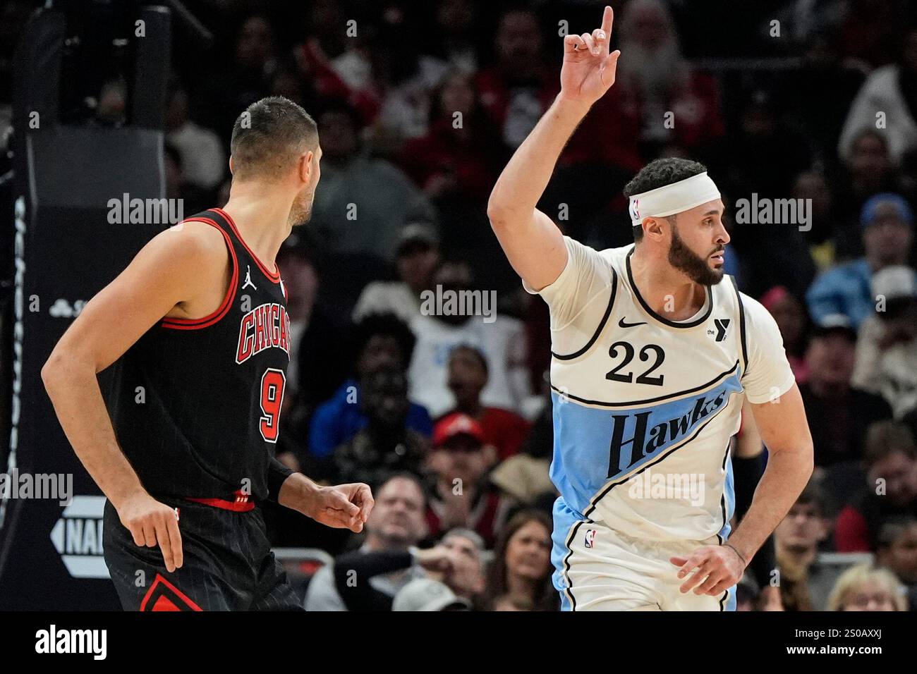 Atlanta Hawks forward Larry Nance Jr. (22) celebrates a basket against ...