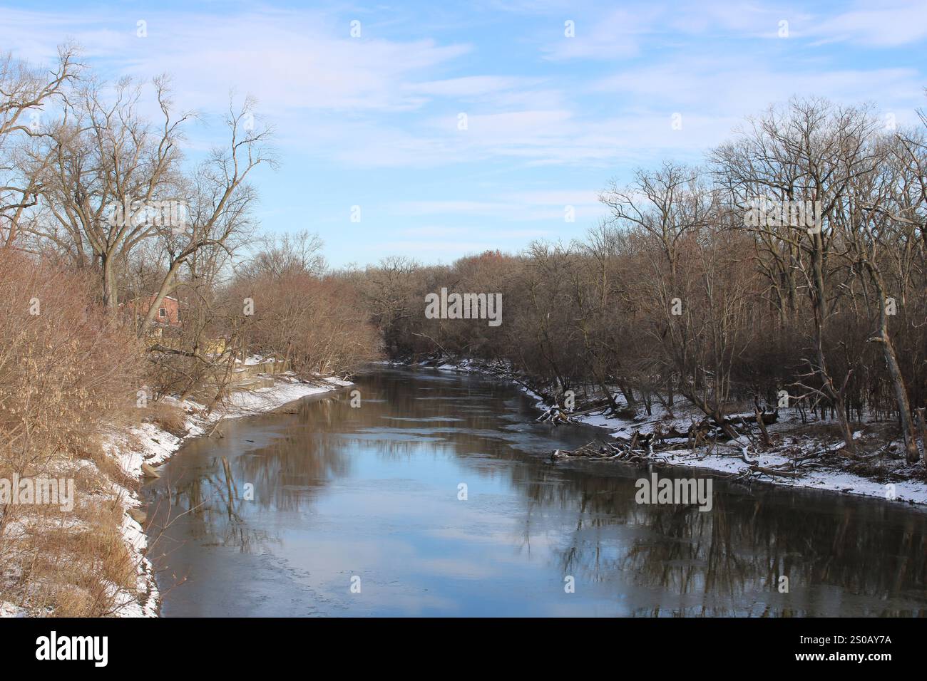Des Plaines River with a reflection and snow on its banks at Camp ...