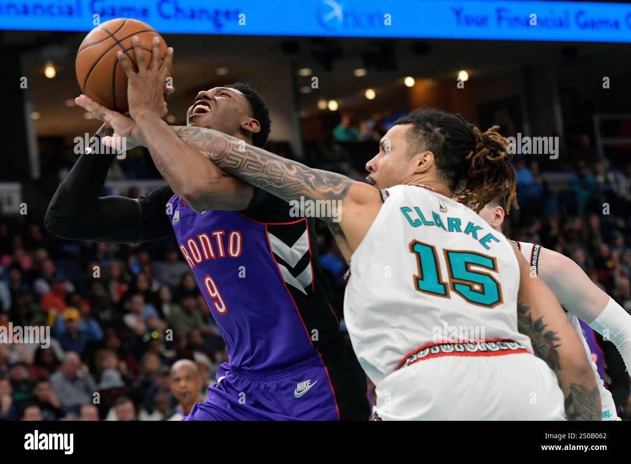 Memphis Grizzlies forward Brandon Clarke (15) fouls Toronto Raptors ...