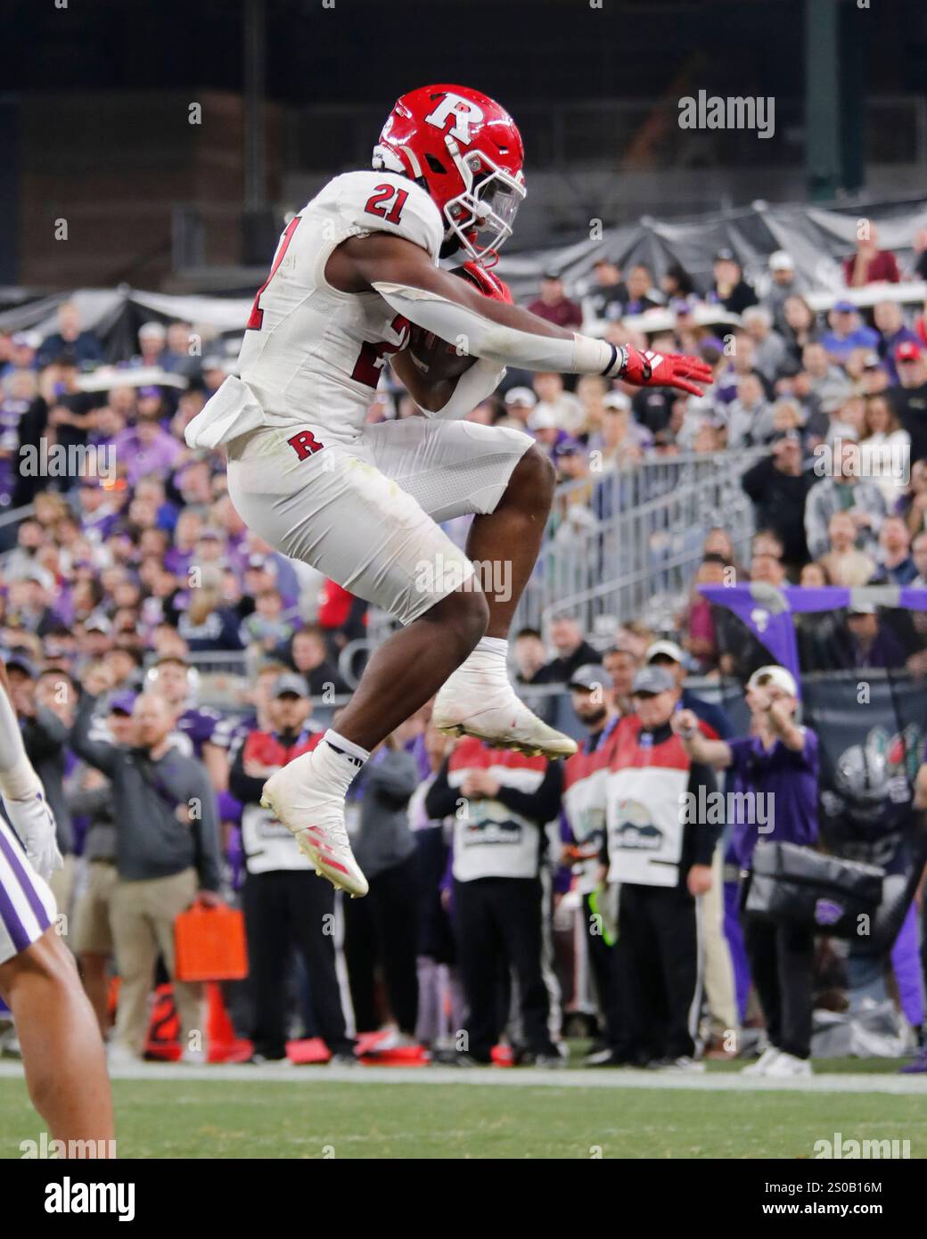 Phoenix, Arizona, USA. 26th Dec, 2024. Rutgers Scarlet Knights running ...