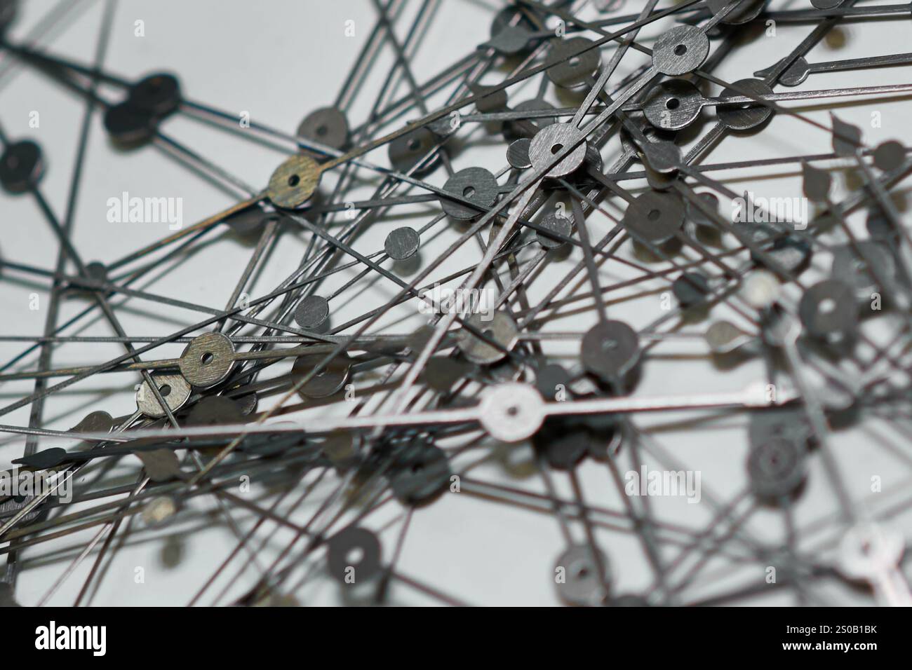 Clock hands intertwined in a delicate dance of time, showcasing the ...