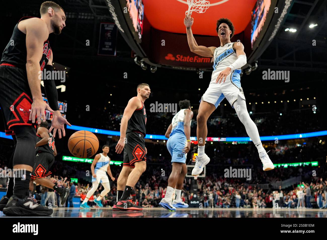 Atlanta Hawks forward Jalen Johnson (1) celebrates after a dunk against ...