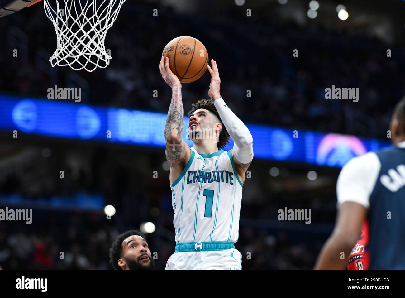 Charlotte Hornets guard LaMelo Ball (1) goes to the basket for a layup ...