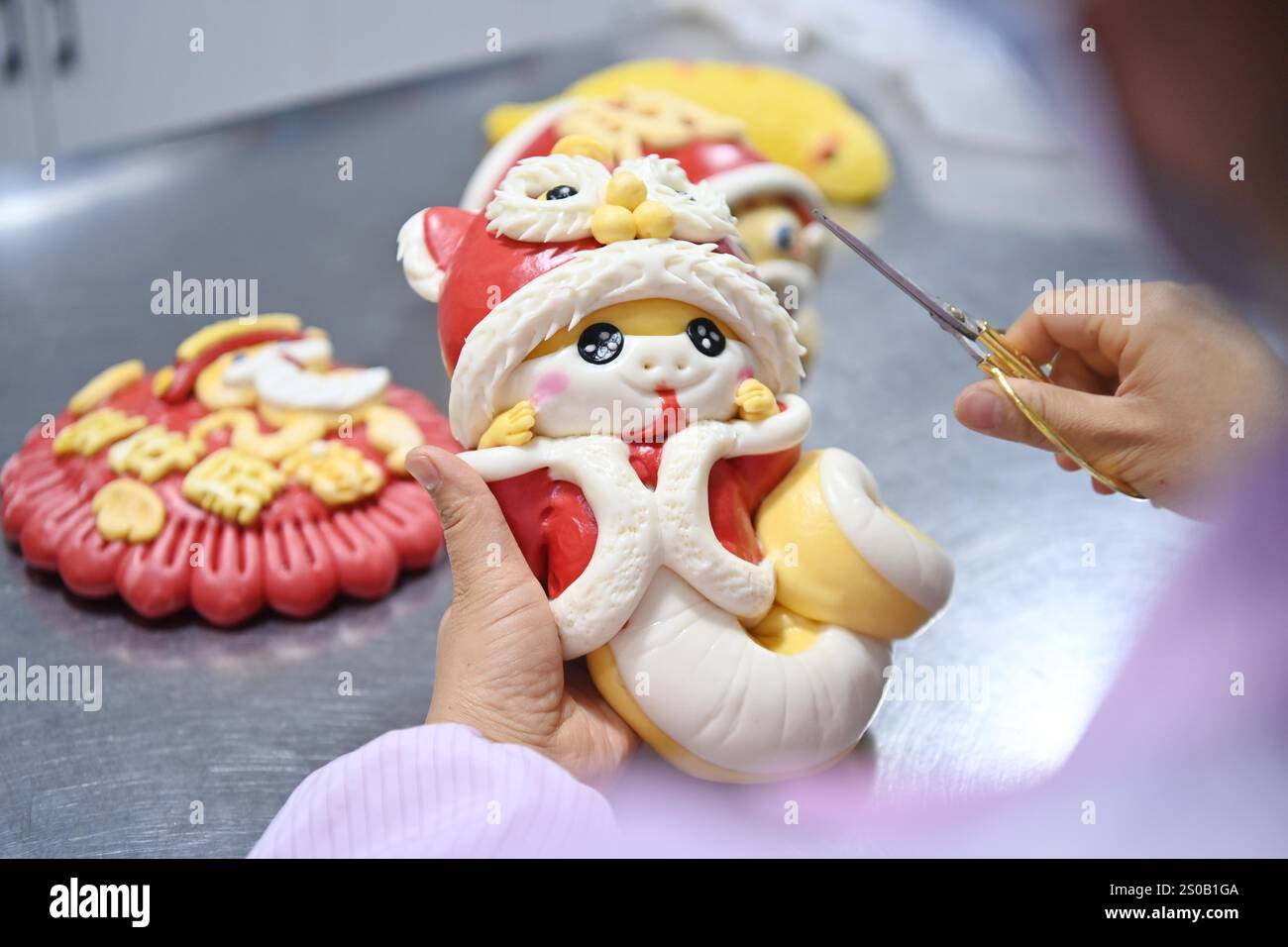 **CHINESE MAINLAND, HONG KONG, MACAU AND TAIWAN OUT** Snake-shaped ...