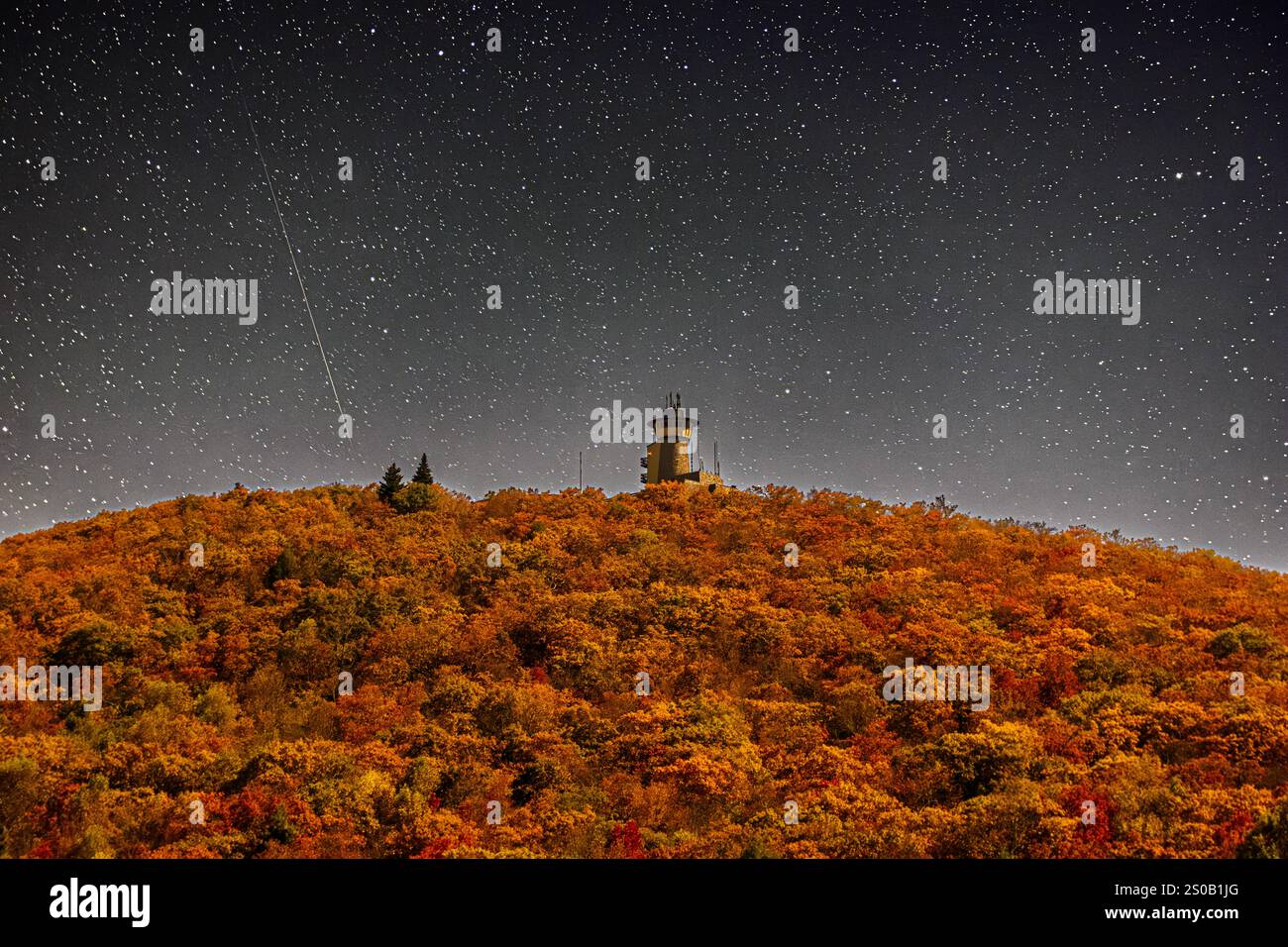 A shooting star over the Forest Service Fire Watch Tower and Visitor ...
