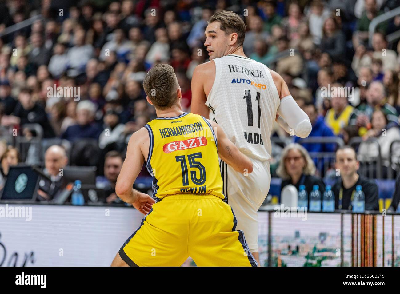 Berlin, Germany. 26th Dec, 2024. Mario Hezonja (R) of Real Madrid and ...