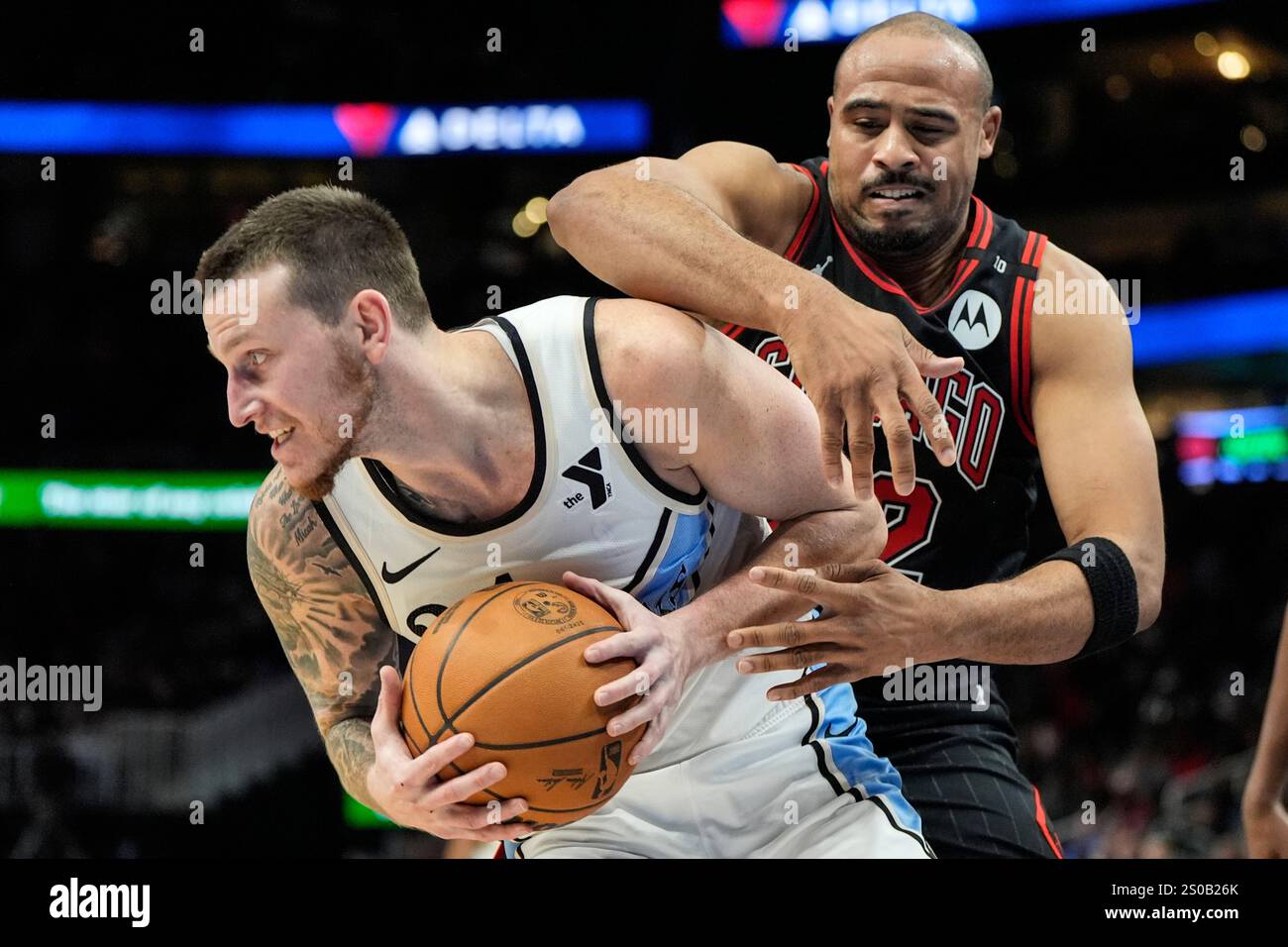 Atlanta Hawks guard Garrison Mathews (24) takes a rebound away from ...