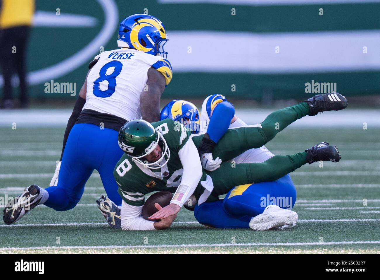 Los Angeles Rams defensive end Braden Fiske (55) brings down New York ...