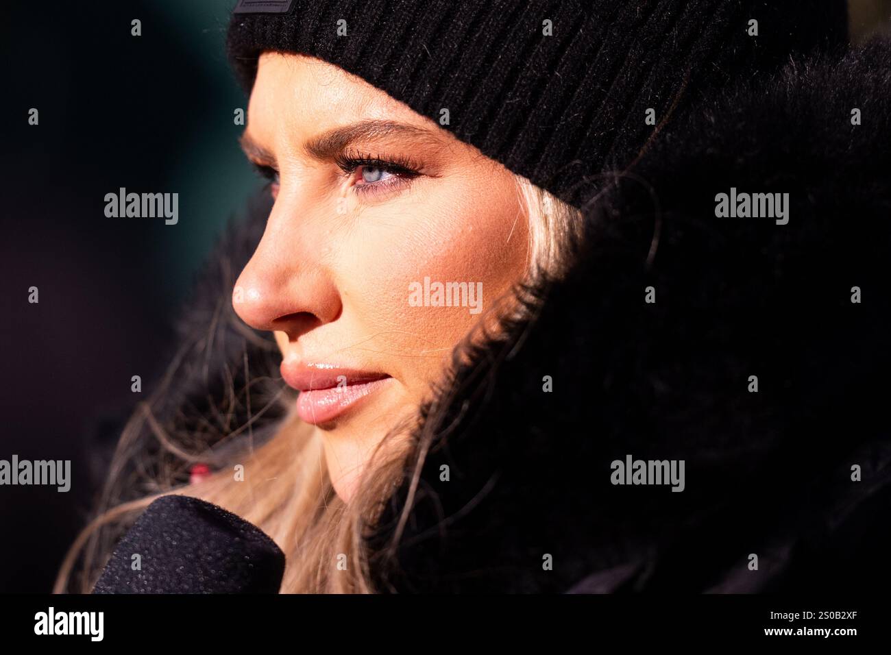 CBS sideline reporter Melanie Collins looks on during the NFL football ...