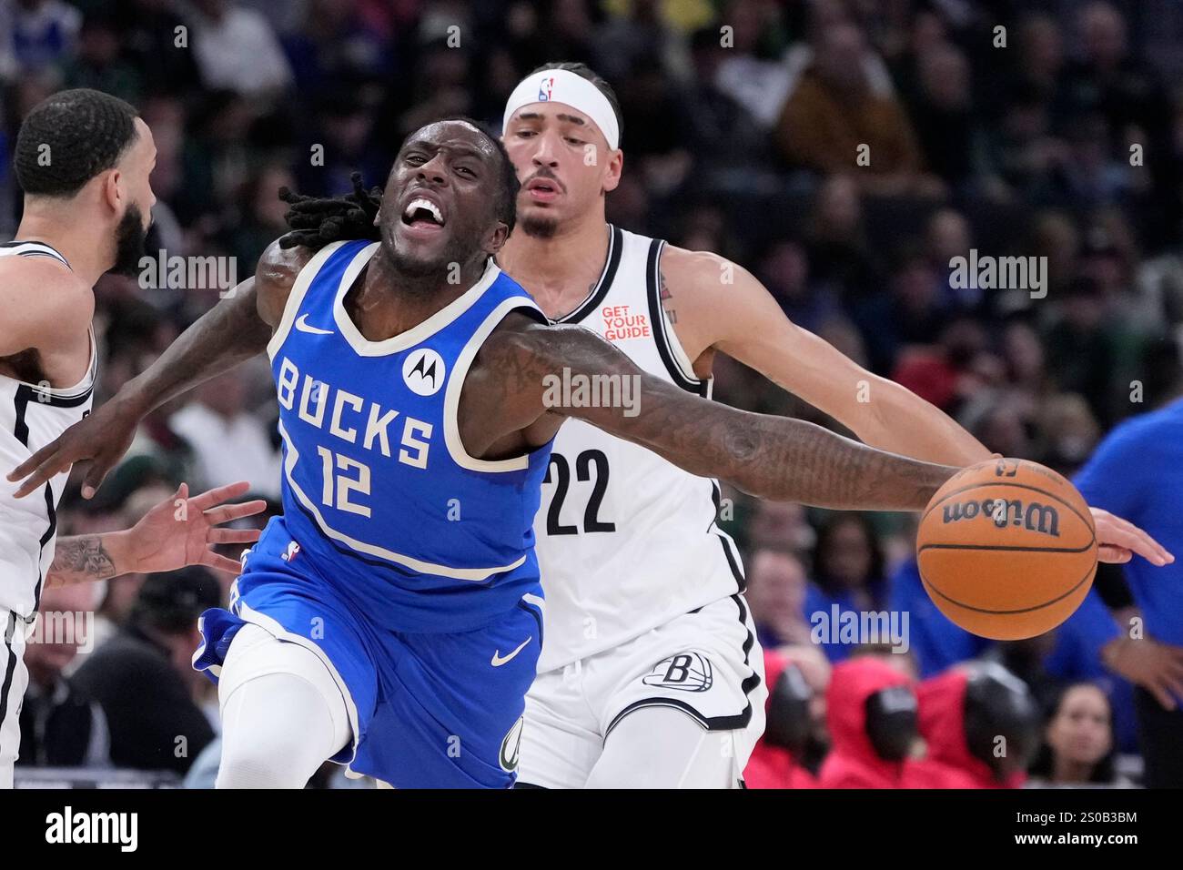 Milwaukee Bucks' Taurean Prince is fouled by Brooklyn Nets' Jalen ...