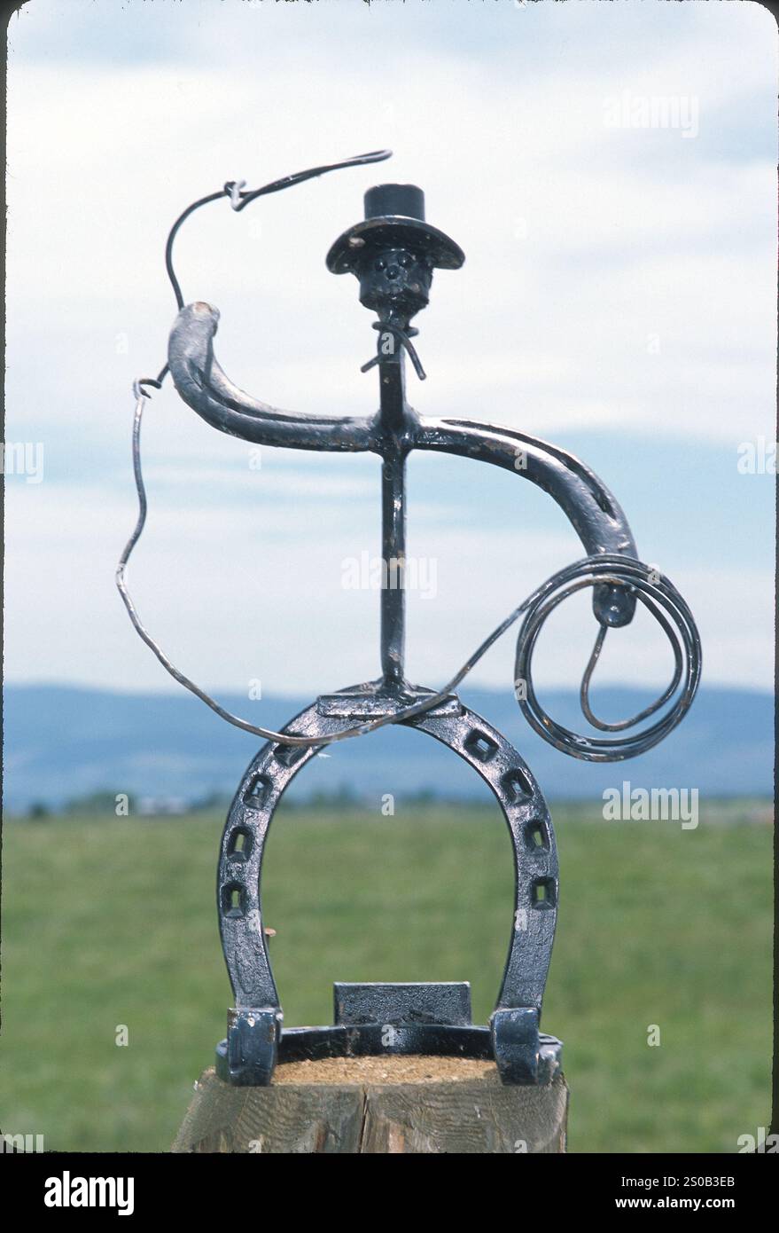 Untitled junkyard art "cowboy" twirling his lariat. Welded from ...