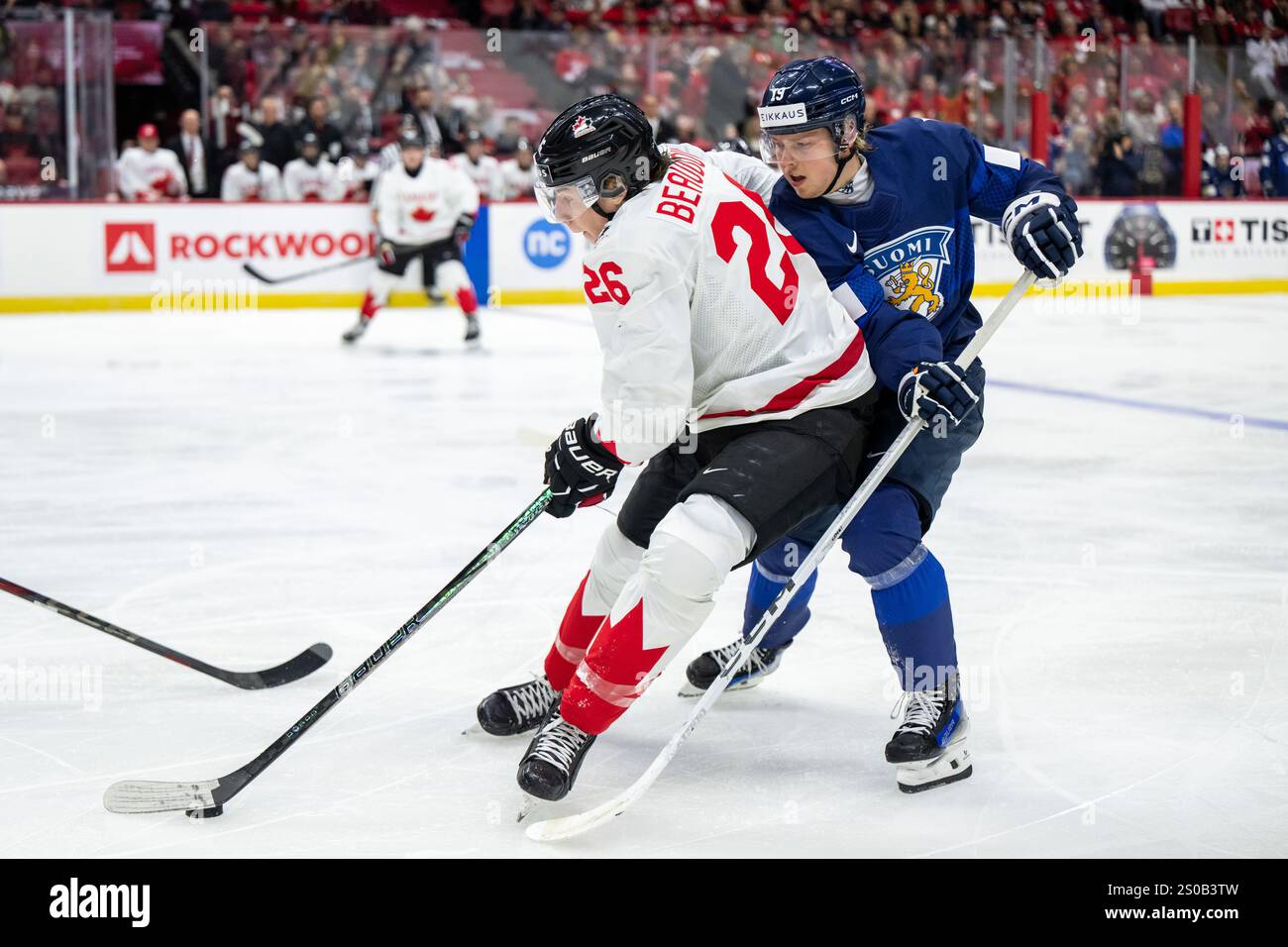 Cole Beaudoin of, Canada. , . and Konsta Helenius of Finland during the ...