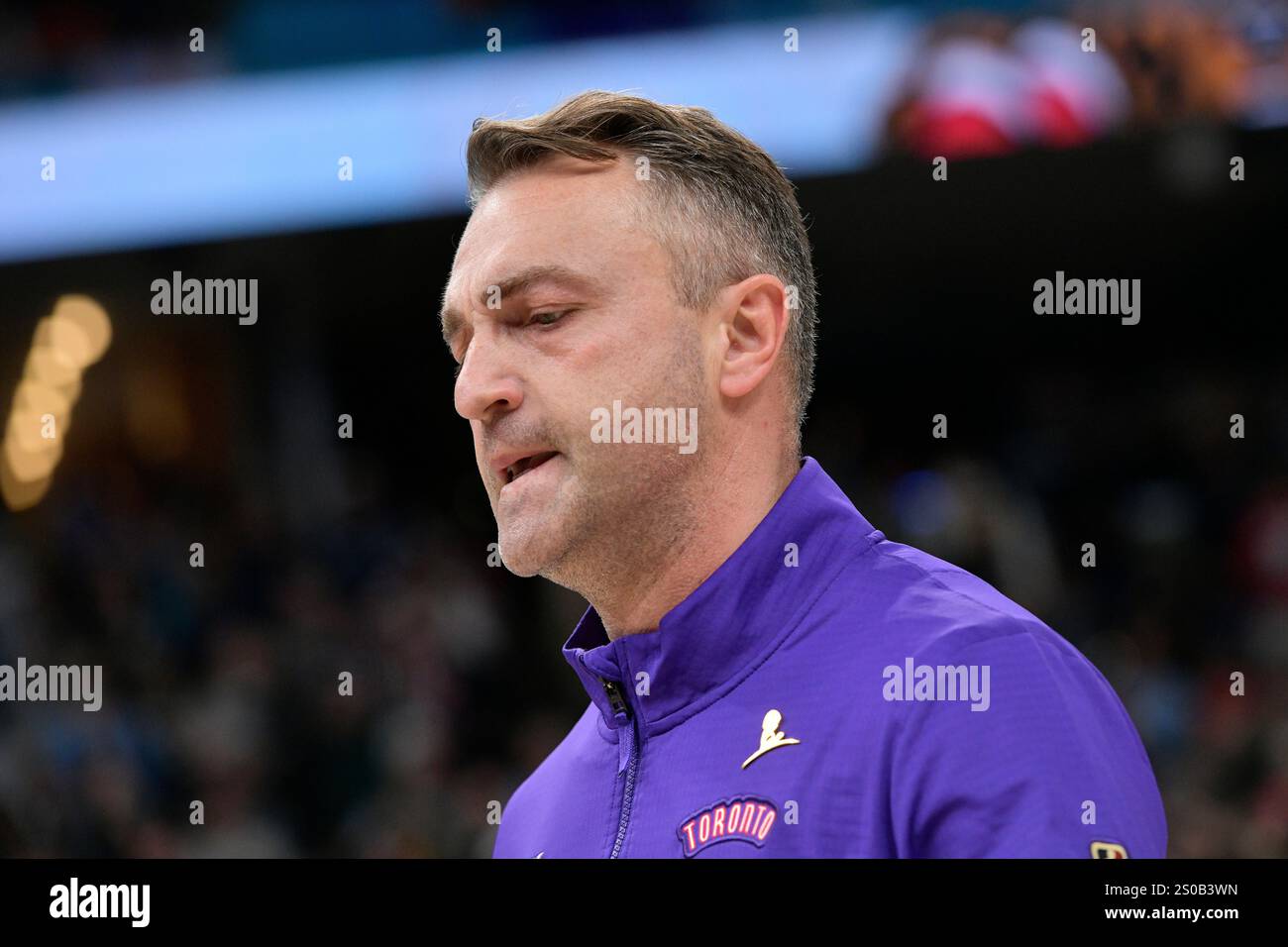 Toronto Raptors head coach Darko Rajakovic walks off of the court after ...