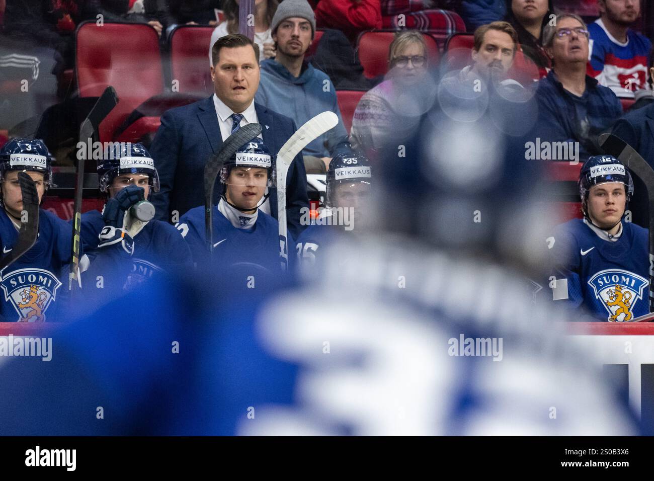 Head coach Lauri Mikkola of, Finland. , . during the 2025 IIHF World Junior Championship game ...