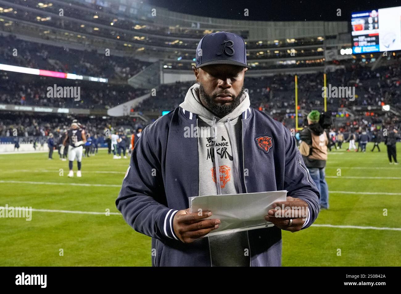 Chicago Bears interim head coach Thomas Brown leaves the field ...