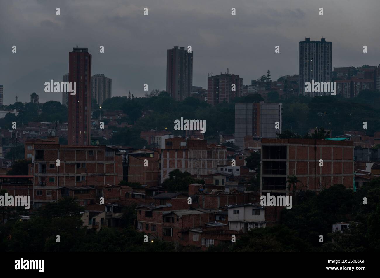 Urban landscape at dusk. A mix of high-rises and densely packed ...
