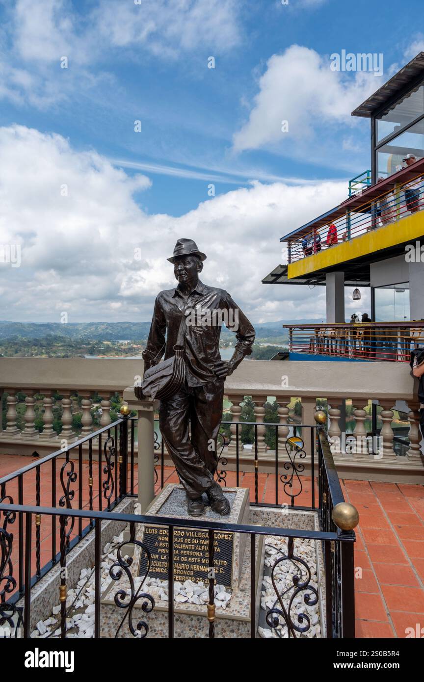 A bronze statue overlooks a scenic vista, a moment of quiet ...