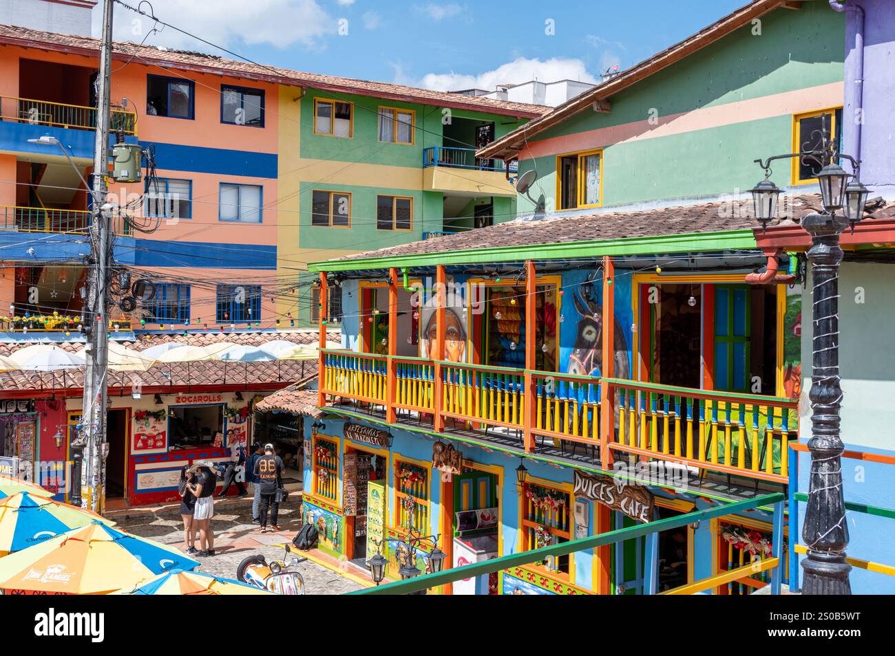 Vibrant streets and colorful buildings create a lively atmosphere ...