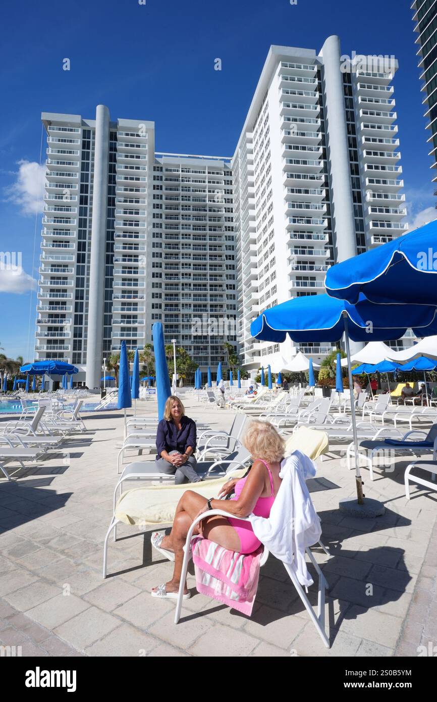 Kelli Roiter talks to her mother Hilda on the pool deck of their ...