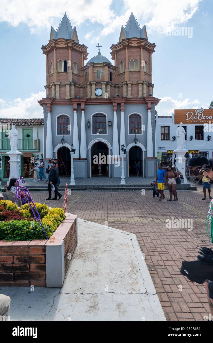 A charming town square, centered by a beautiful church. Peaceful ...