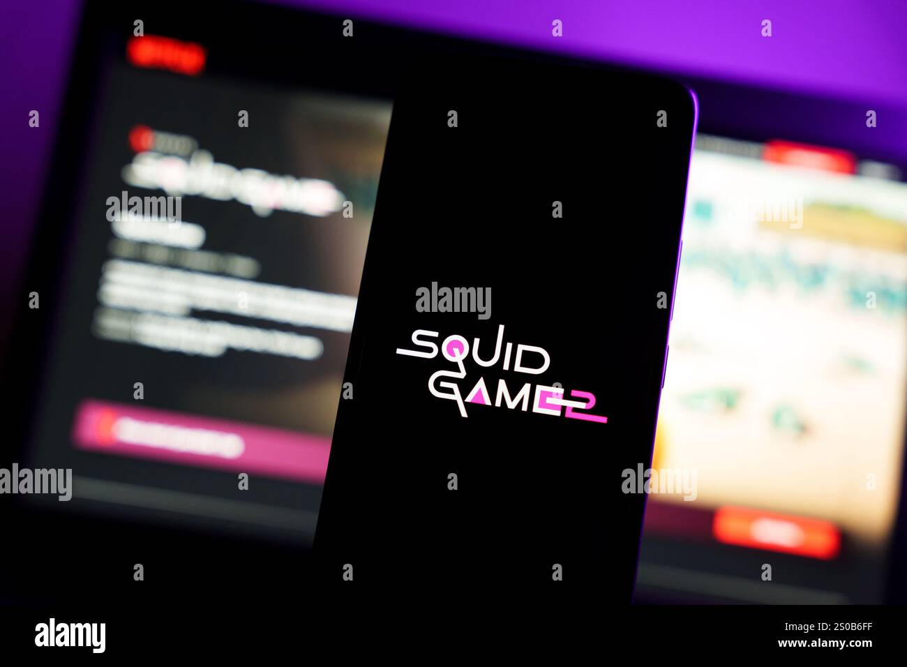 TV show Squid game 2 logo displayed on smartphone screen. December 26 ...