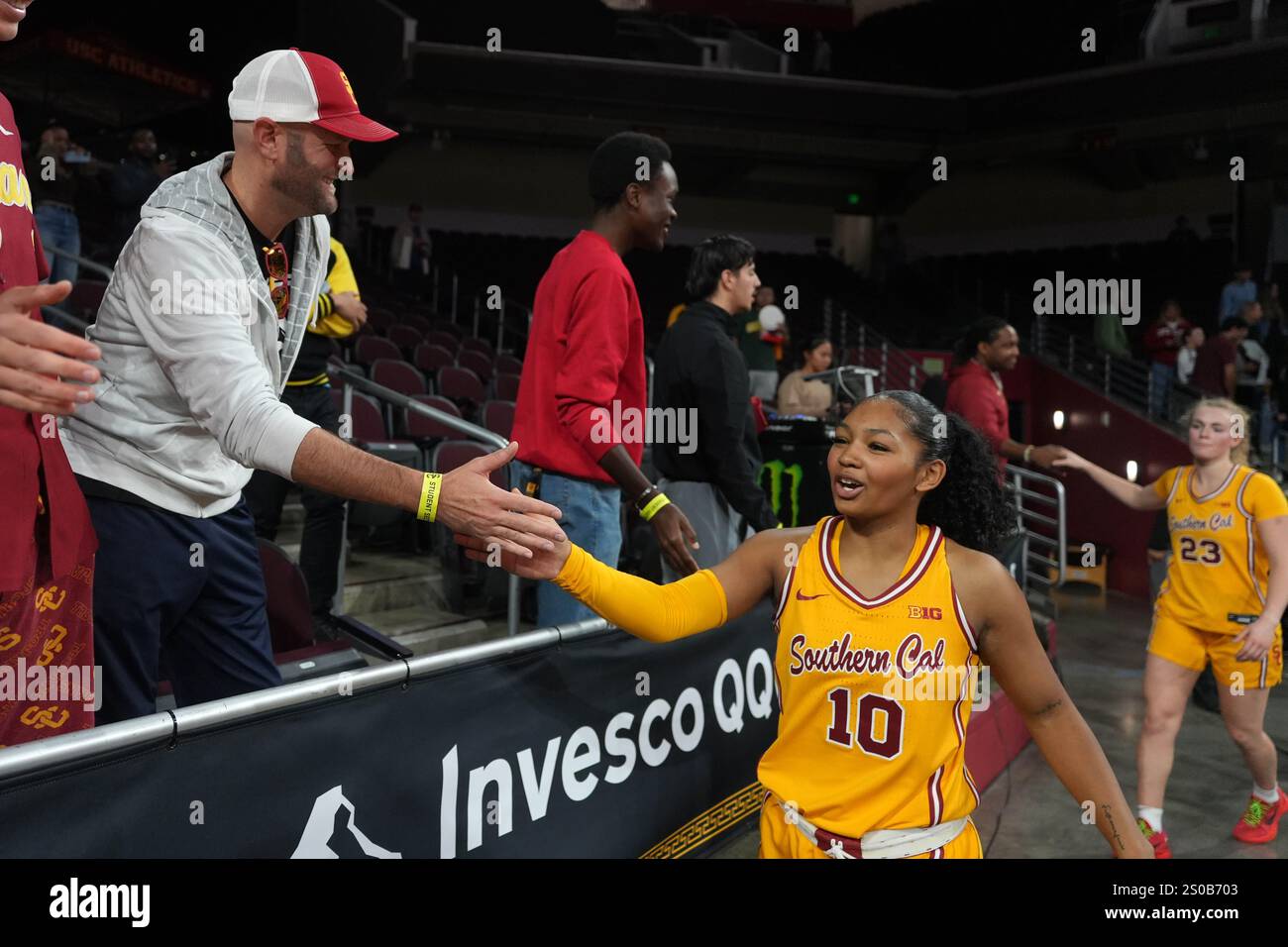Southern California Trojans guard Malia Samuels (10) is greeted by ...