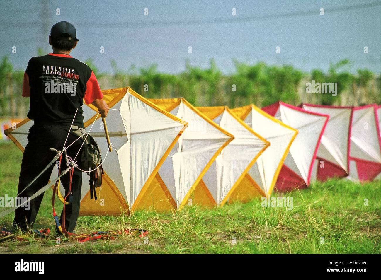 A man preparing a giant kite during the 2004 Jakarta International Kite ...