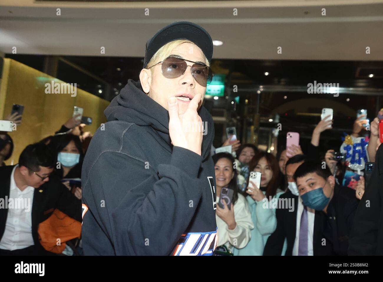 Hong Kong singer, dancer and actor Aaron Kwok arrives in Taipei City ...