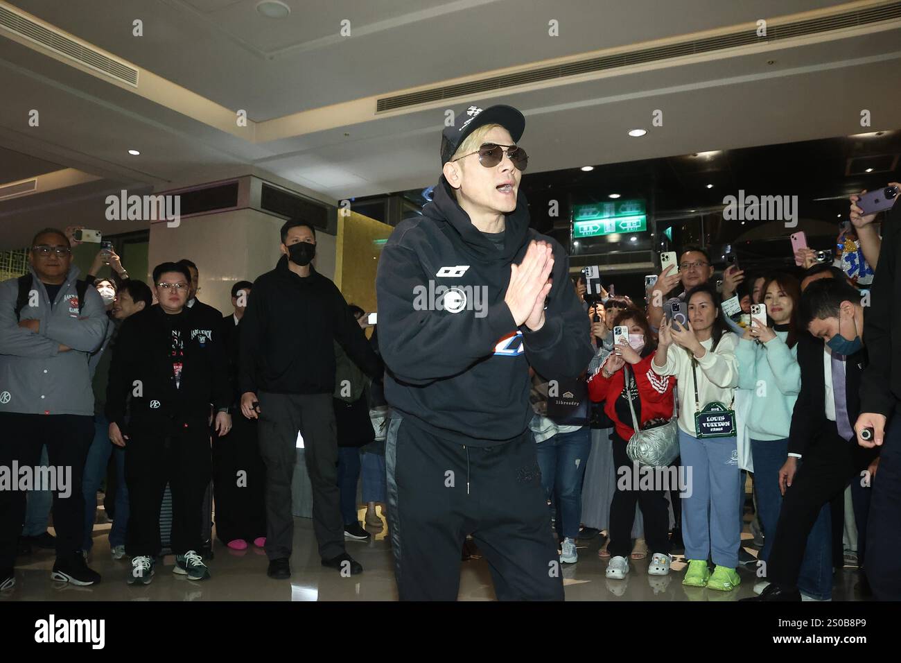 Hong Kong singer, dancer and actor Aaron Kwok arrives in Taipei City ...