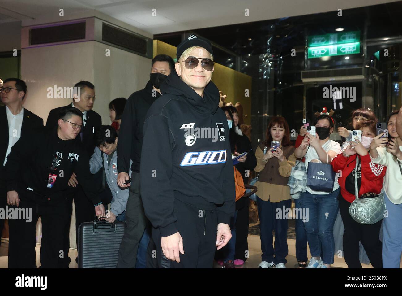 Hong Kong singer, dancer and actor Aaron Kwok arrives in Taipei City ...