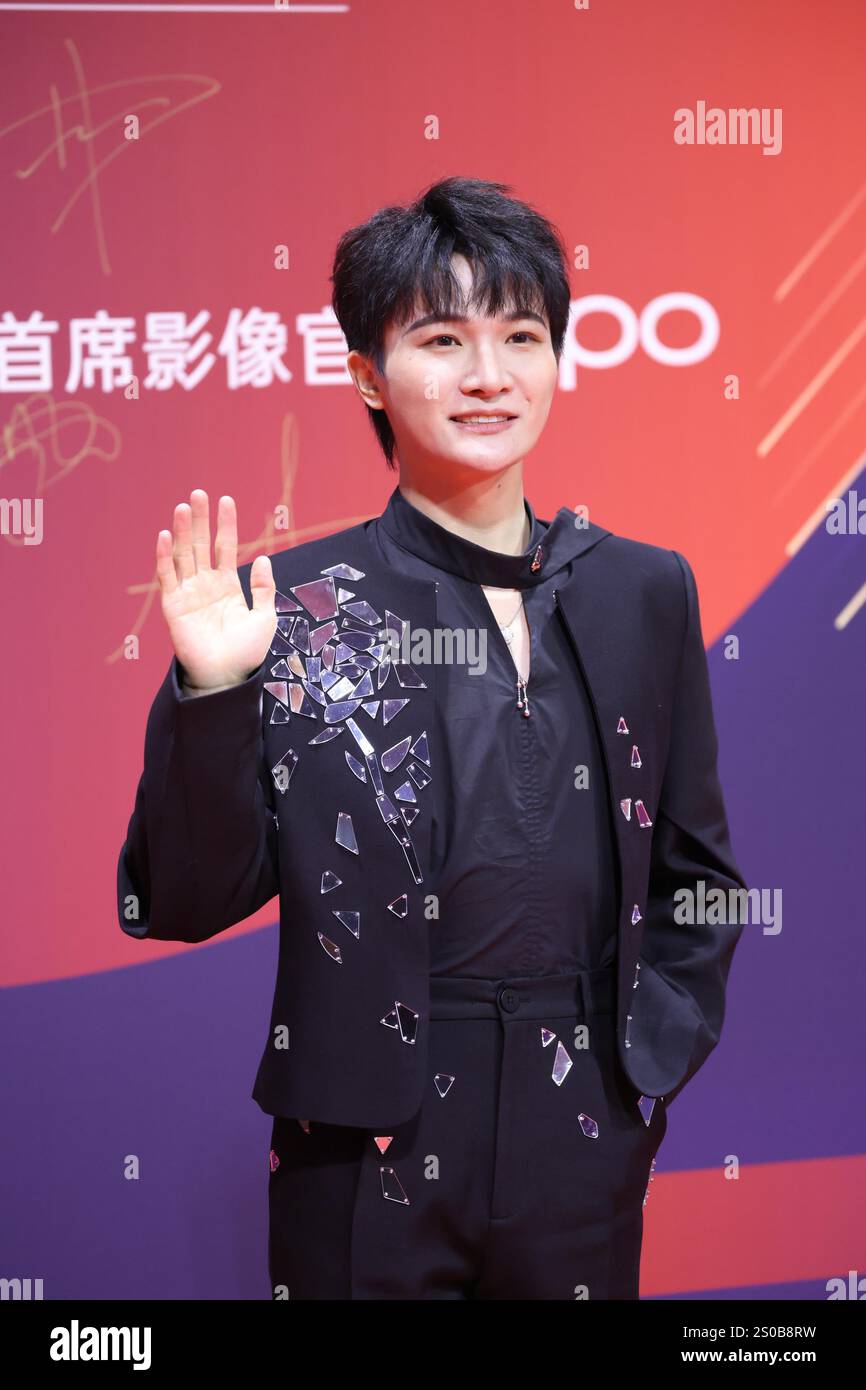 Chinese singer Zhou Shen attends an activity in Beijing, China, 25 ...