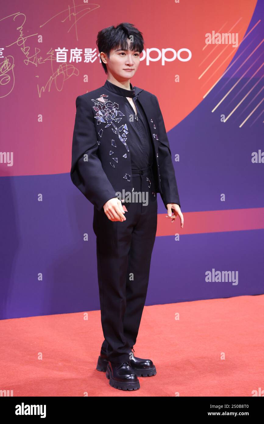 Chinese singer Zhou Shen attends an activity in Beijing, China, 25 ...