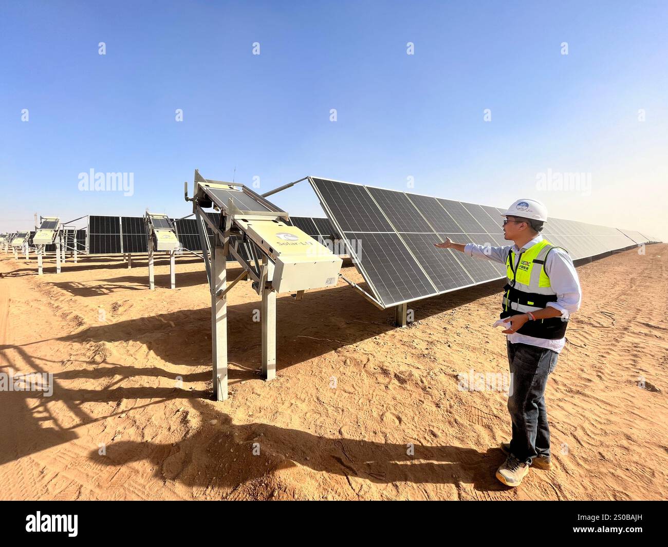 Beijing, Egypt. 24th Nov, 2024. A staff member makes an introduction at ...