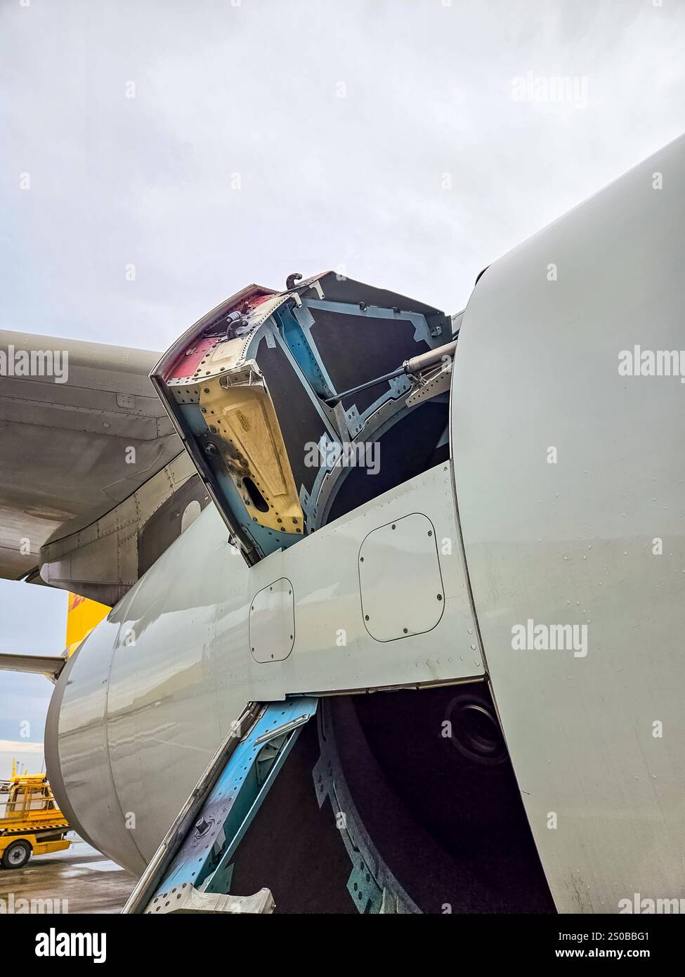 Close-up of an aircraft cargo door being opened. High quality photo ...