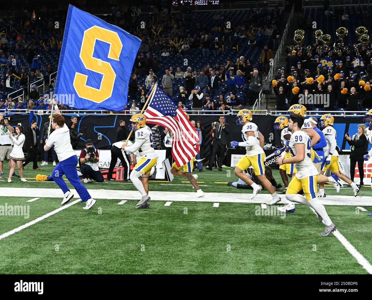 Detroit, Michigan, USA. 26th Dec, 2024. The Pitt football team takes to ...