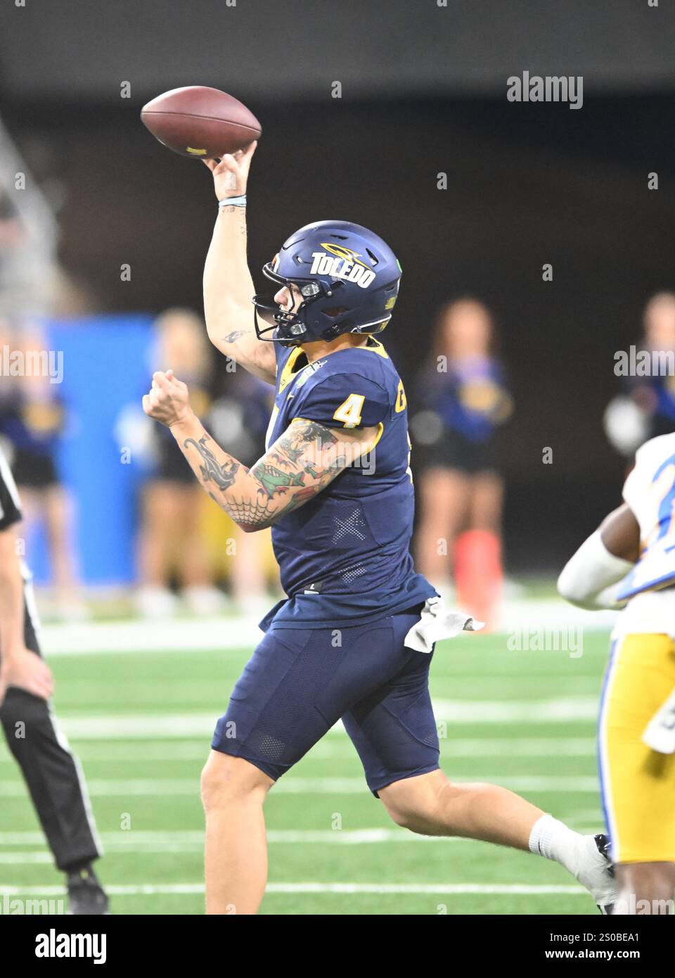 Detroit, Michigan, USA. 27th Dec, 2024. Toledo Quarterback TUCKER ...
