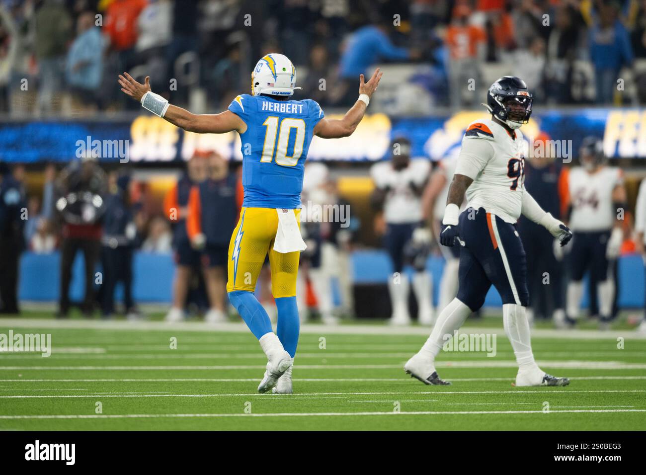 Los Angeles Chargers quarterback Justin Herbert (10) reacts after the ...