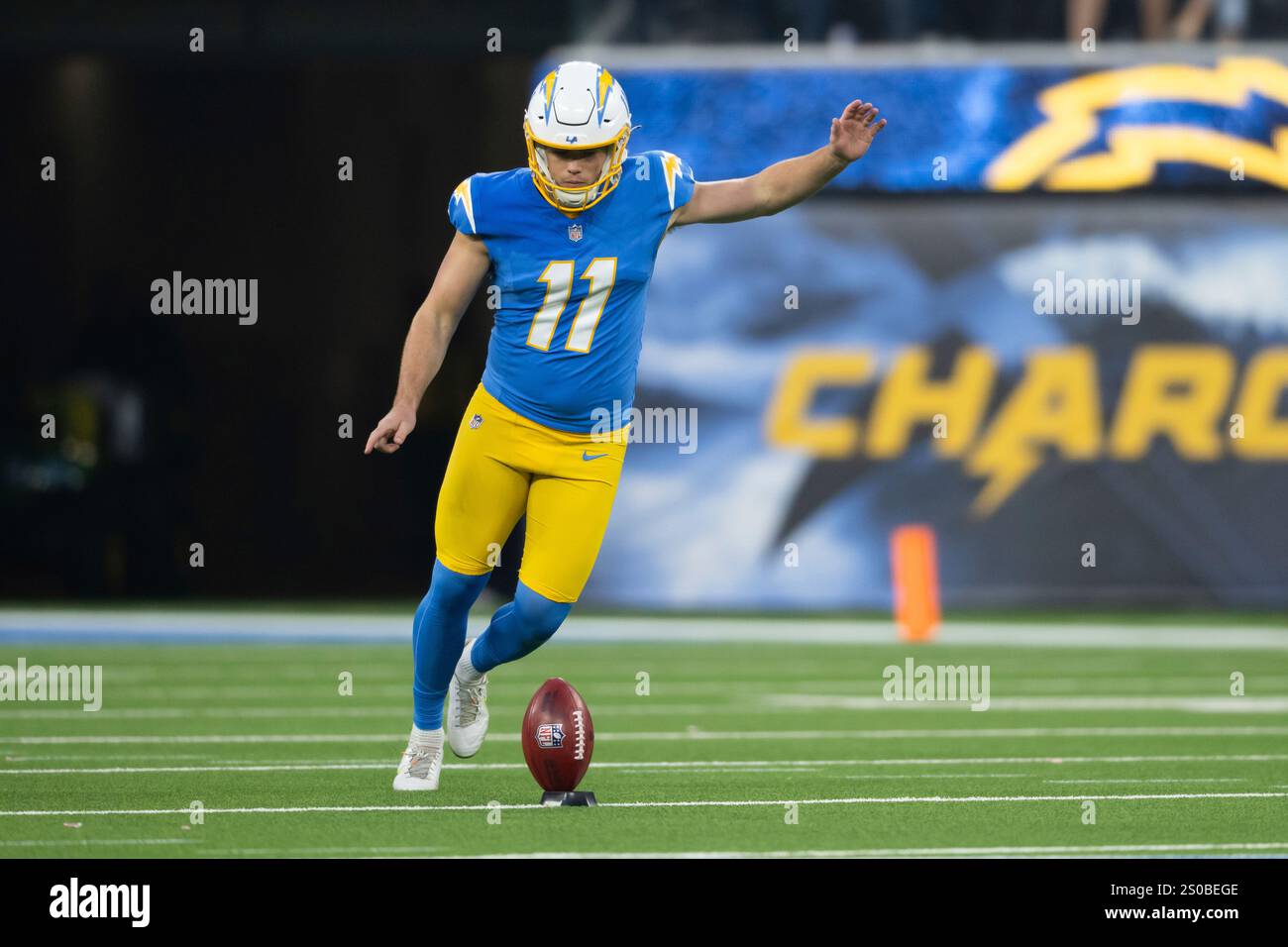 Los Angeles Chargers place kicker Cameron Dicker (11) kicks during an ...