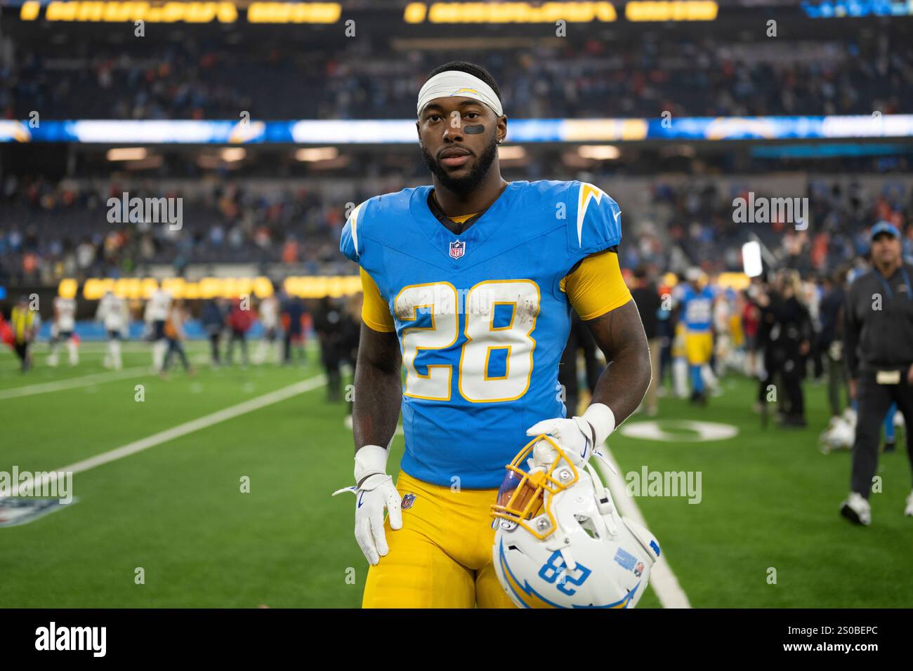 Los Angeles Chargers running back Hassan Haskins (28) walks back to the ...