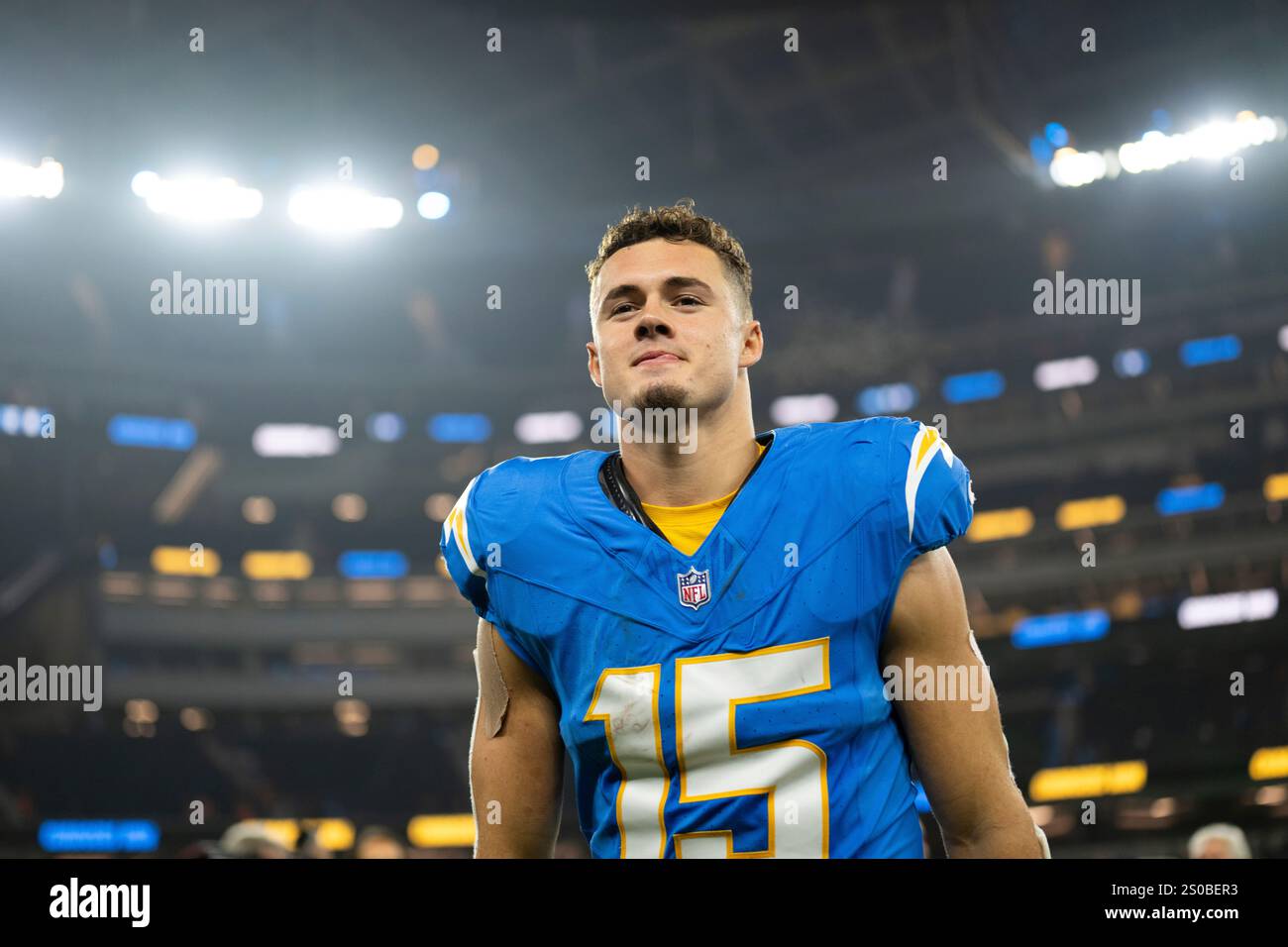 Los Angeles Chargers wide receiver Ladd McConkey (15) jogs back to the ...