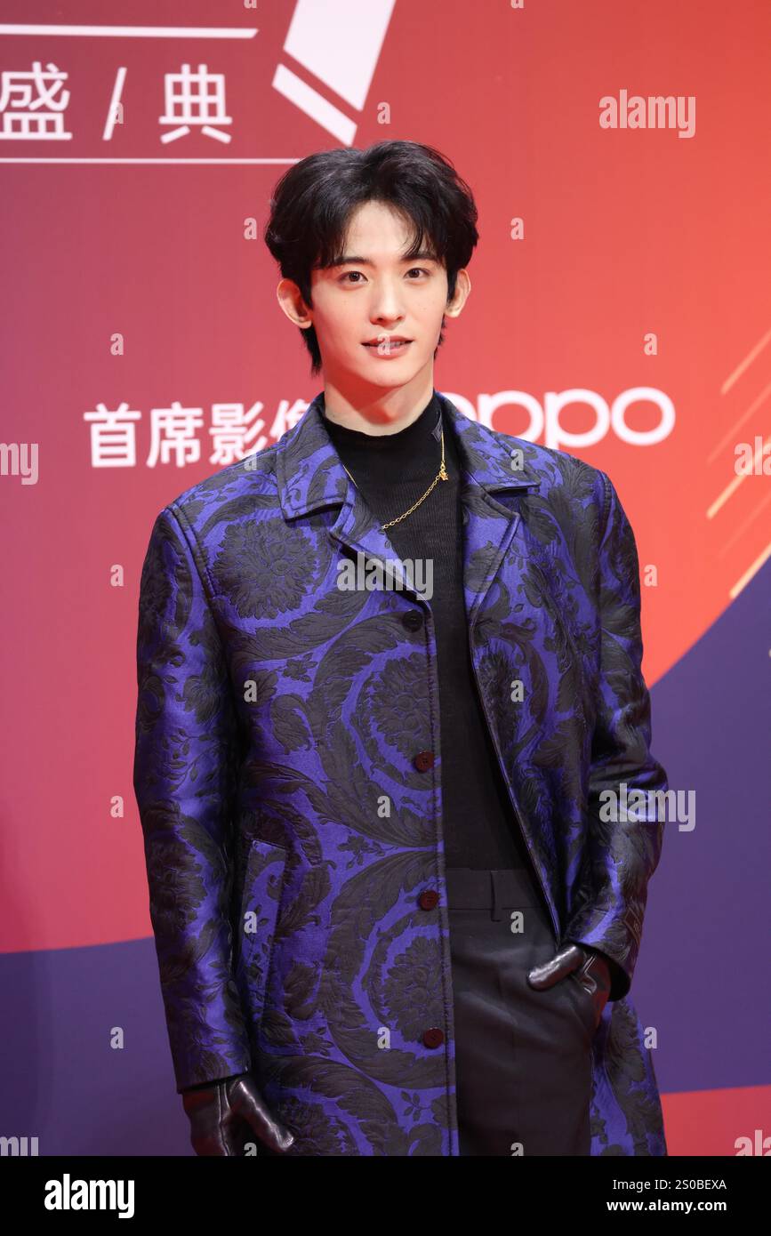 Chinese actor and singer Chang Huasen attends an activity in Beijing ...