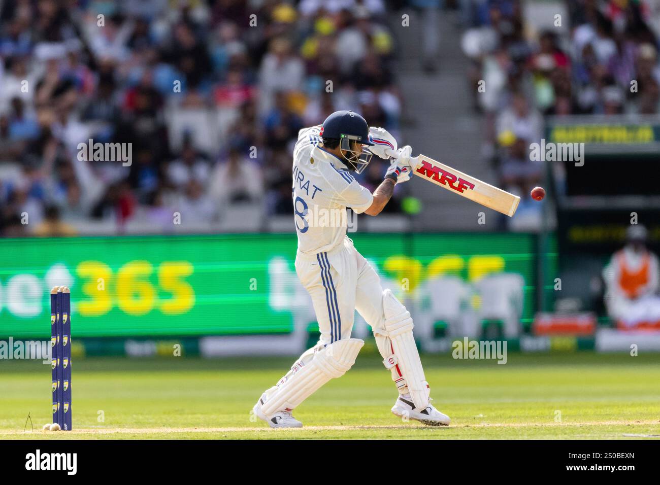 MELBOURNE, AUSTRALIA - DECEMBER 27: Virat Kohli of India pulls during ...