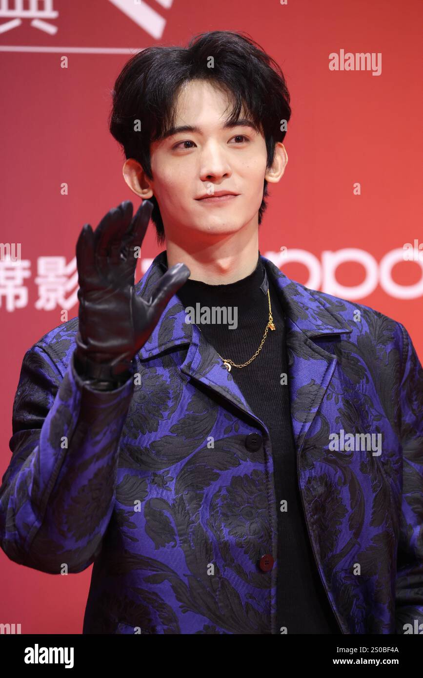 Chinese actor and singer Chang Huasen attends an activity in Beijing ...